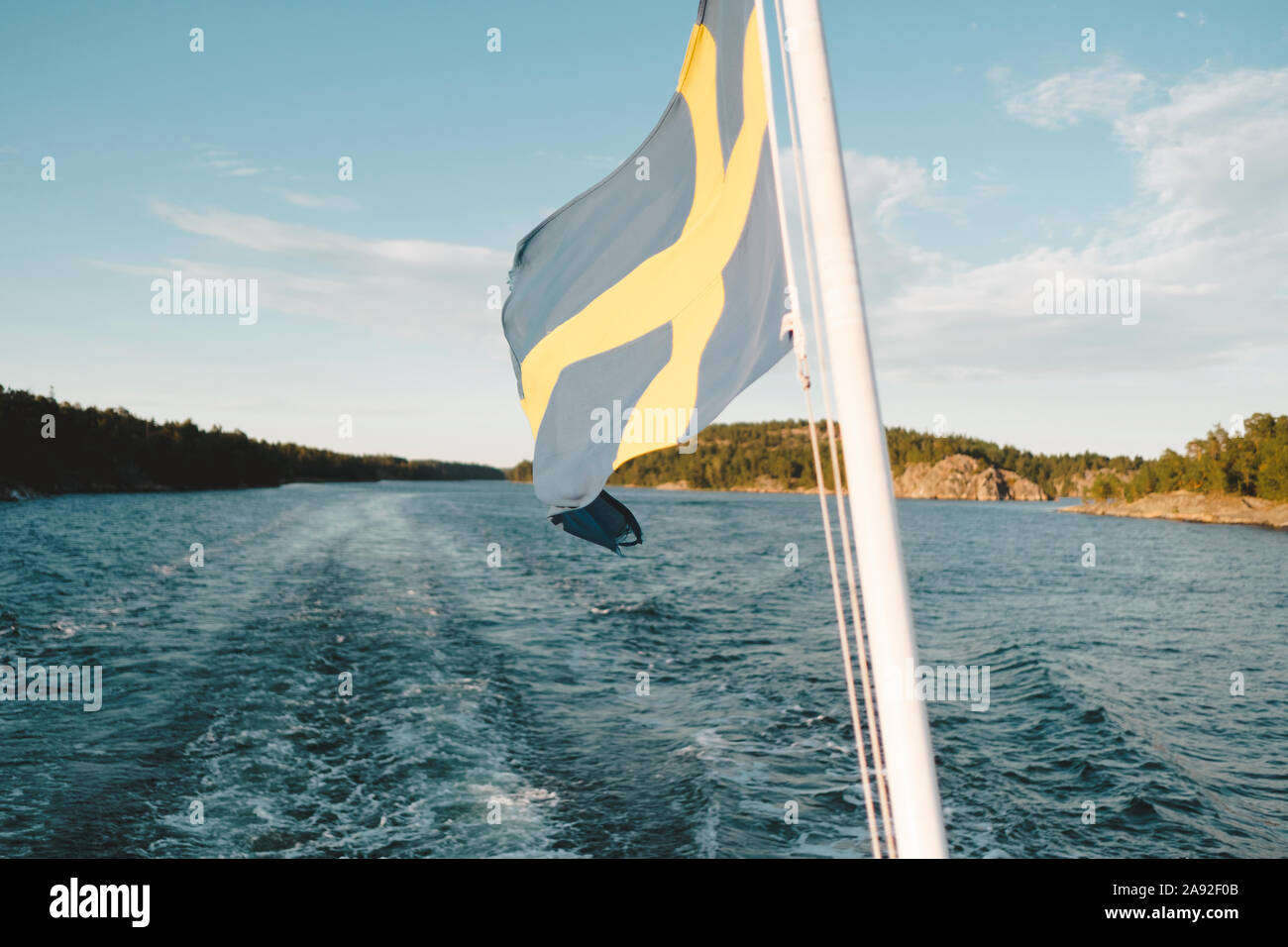 Swedish flag on boat Stock Photo - Alamy