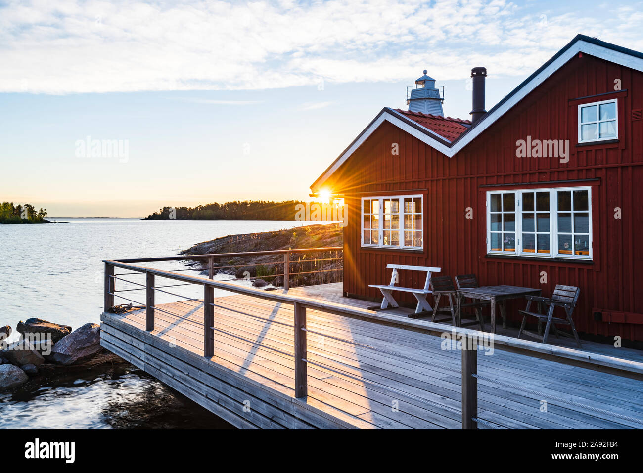 Wooden house at sea Stock Photo - Alamy