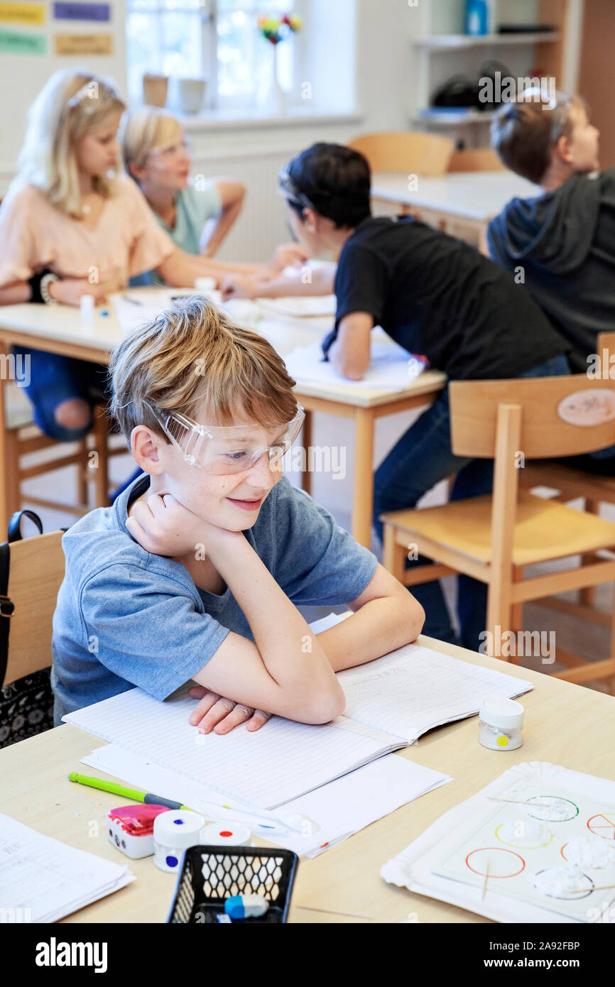 Boy in classroom Stock Photo - Alamy