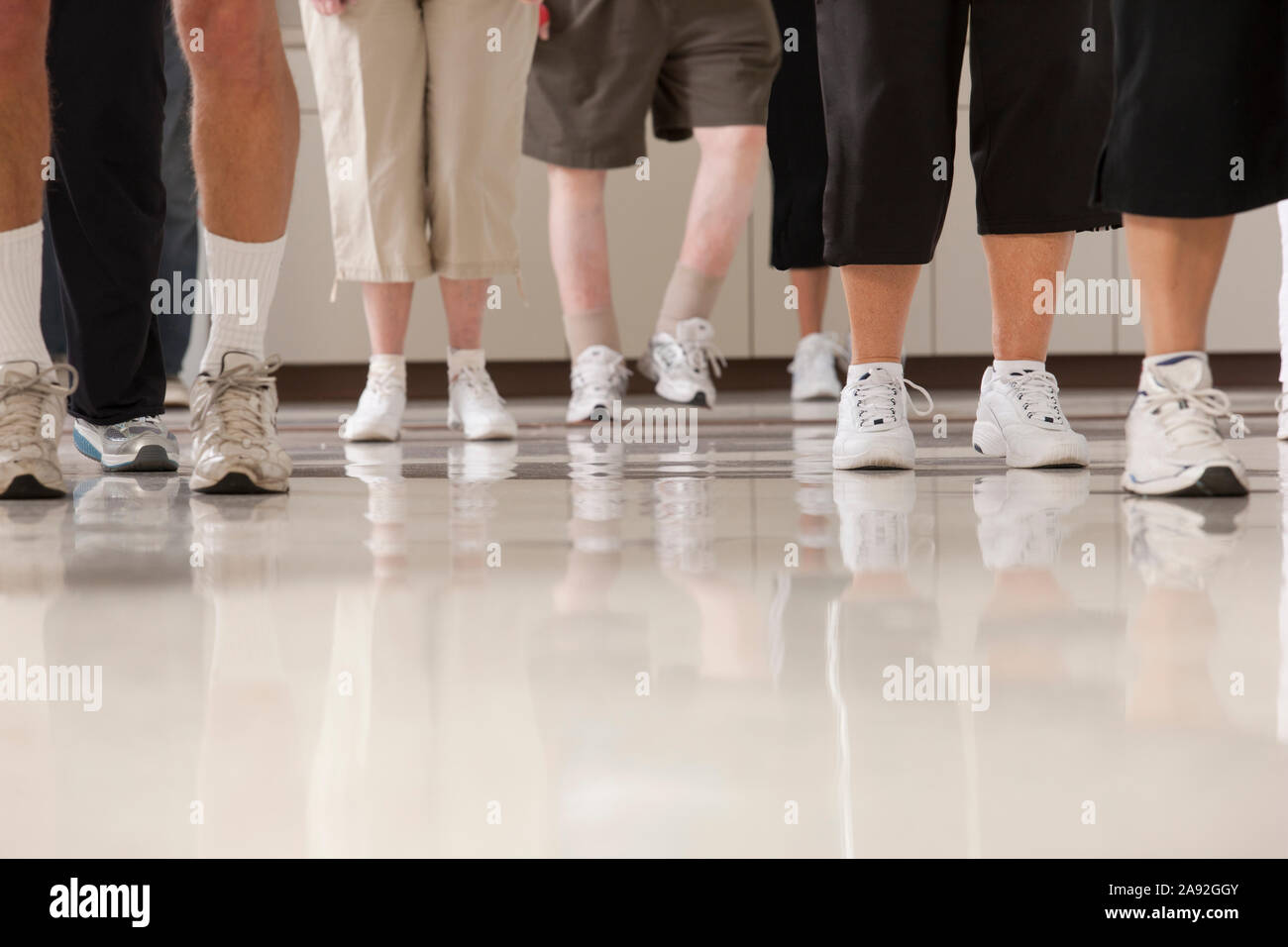 Seniors' exercise class doing cardio Stock Photo - Alamy