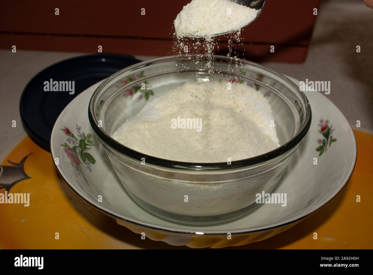 Adding sweetener hi-res stock photography and images - Alamy