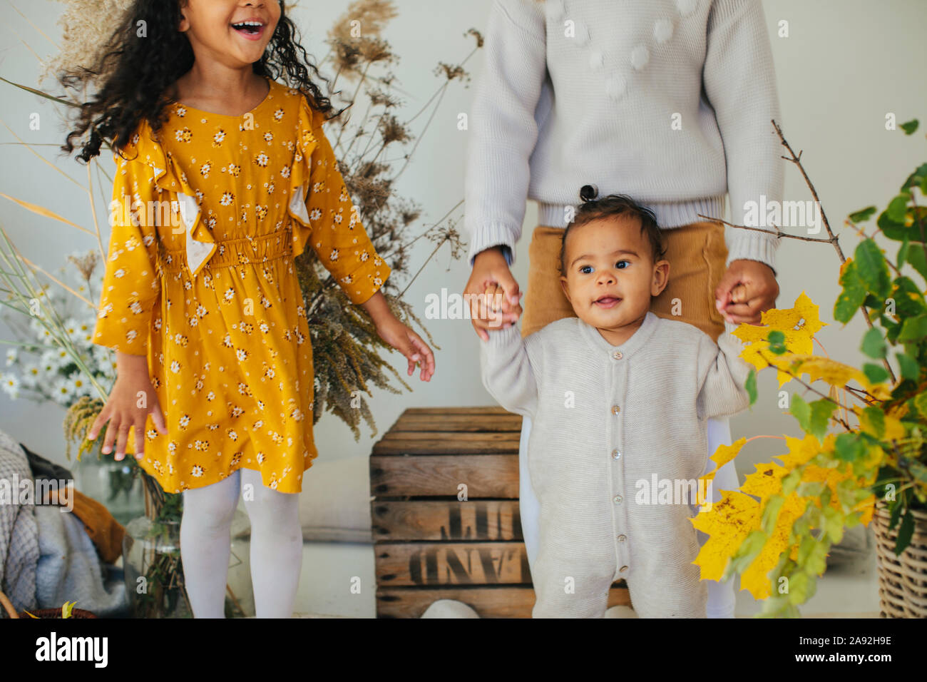 Three girls standing together hi-res stock photography and images - Alamy