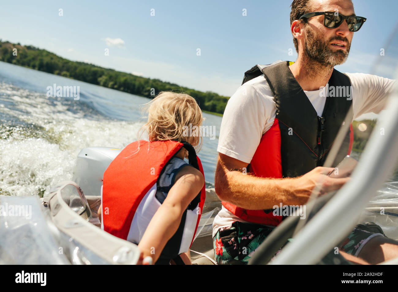 Father with daughter on boat Stock Photo - Alamy