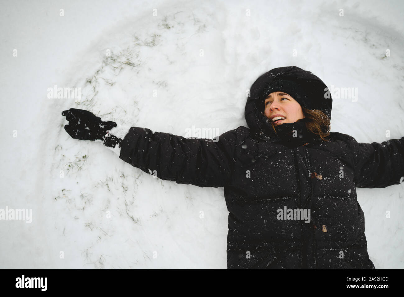 Snow angel adult hi-res stock photography and images - Alamy