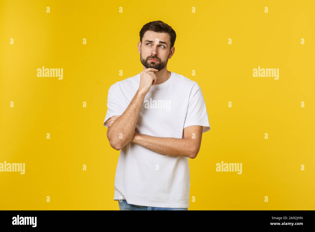Man curious thinking hand gesture hi-res stock photography and images ...
