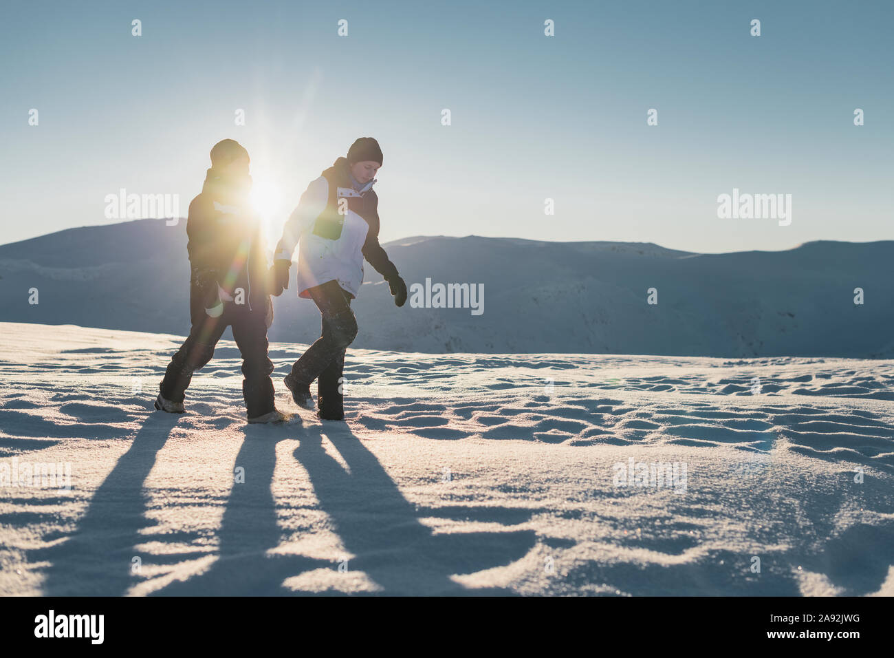 People walking at winter Stock Photo - Alamy