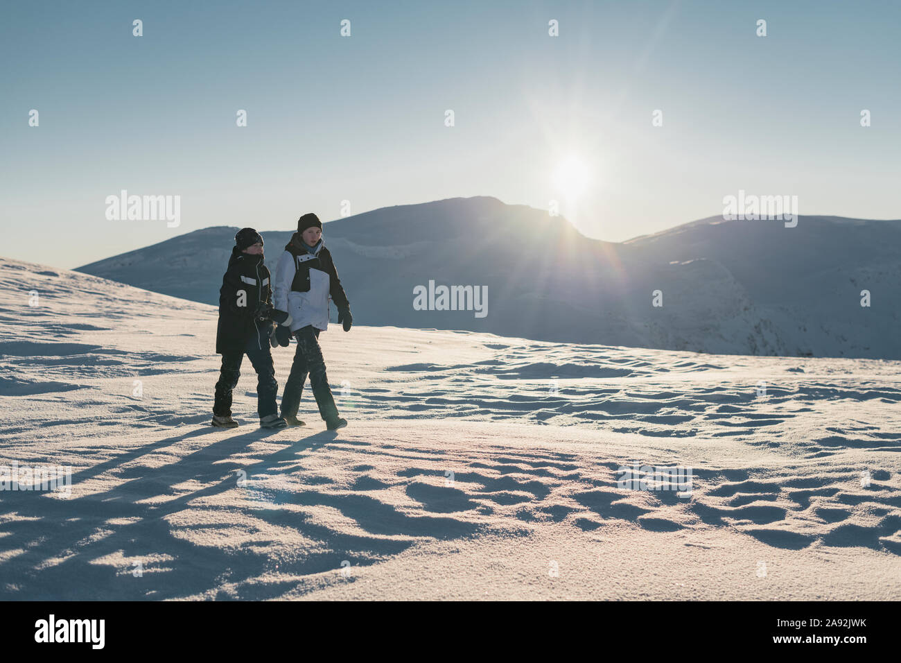 People walking at winter Stock Photo - Alamy