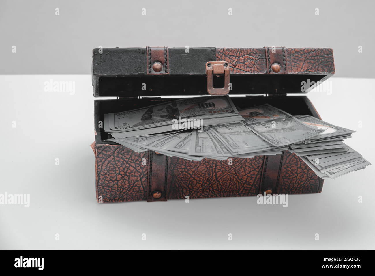 vintage open chest with lots of money. Concept of wealth and abundance ...