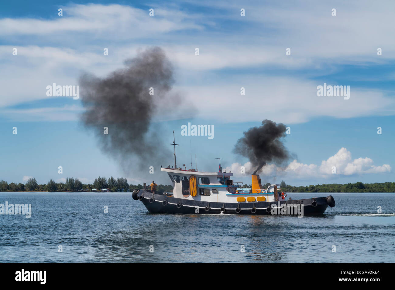 polluting boat on the river in Cambodia Stock Photo - Alamy