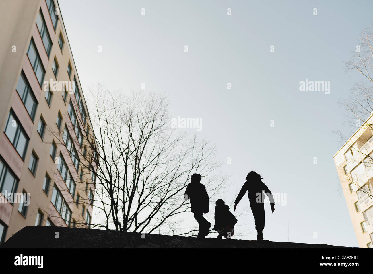 Children silhouette low angle High Resolution Stock Photography and ...