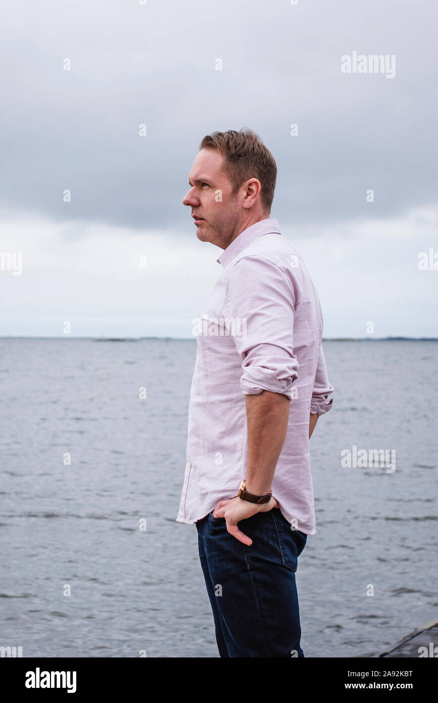 Man at sea Stock Photo - Alamy