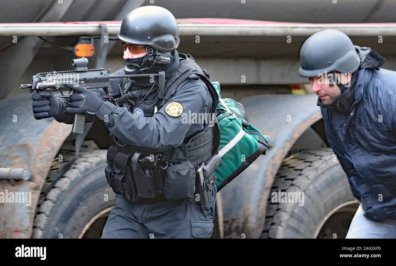 A member of the Garda Emergency Response unit and a hostage negotiators ...