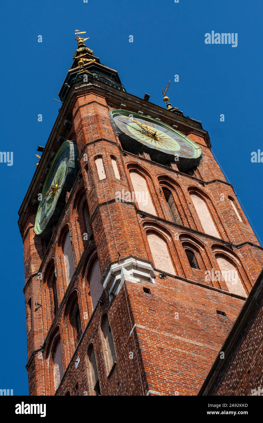 Clock tower of old historic brick town hall in Gdansk old town, Poland ...