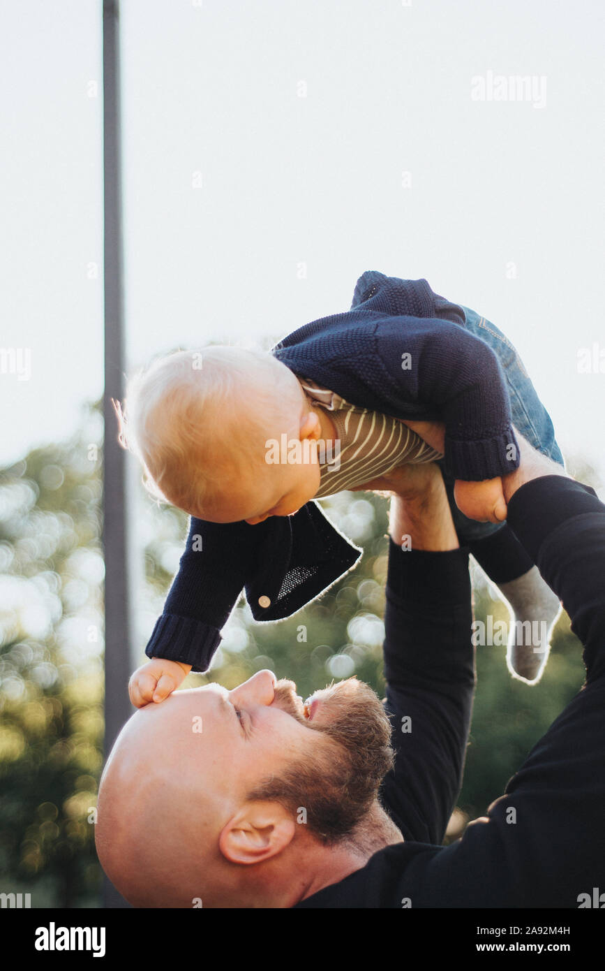 Father playing with baby Stock Photo - Alamy