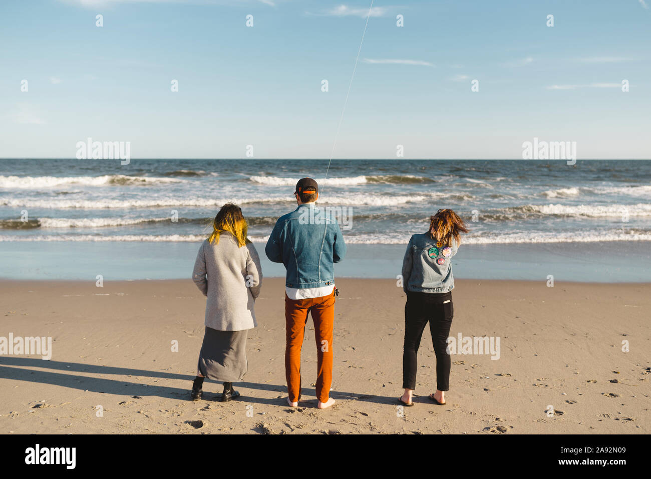 Friends on beach Stock Photo - Alamy