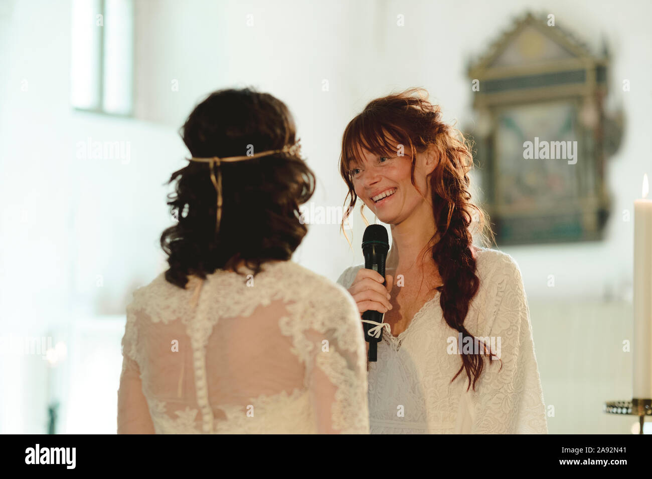 Brides at wedding ceremony Stock Photo - Alamy