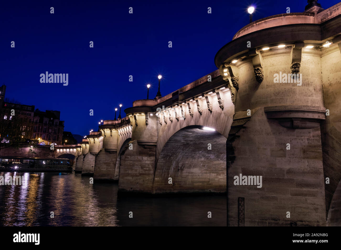 Famous Pont Neuf bridge in Paris at dusk Stock Photo - Alamy