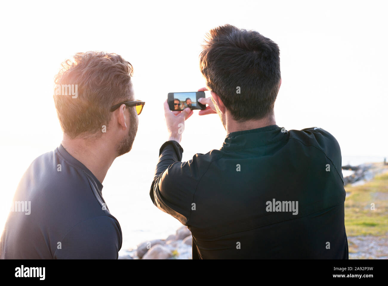 Men taking selfie Stock Photo - Alamy