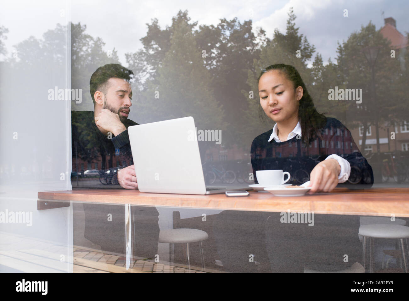 Asian cooperation hi-res stock photography and images - Alamy