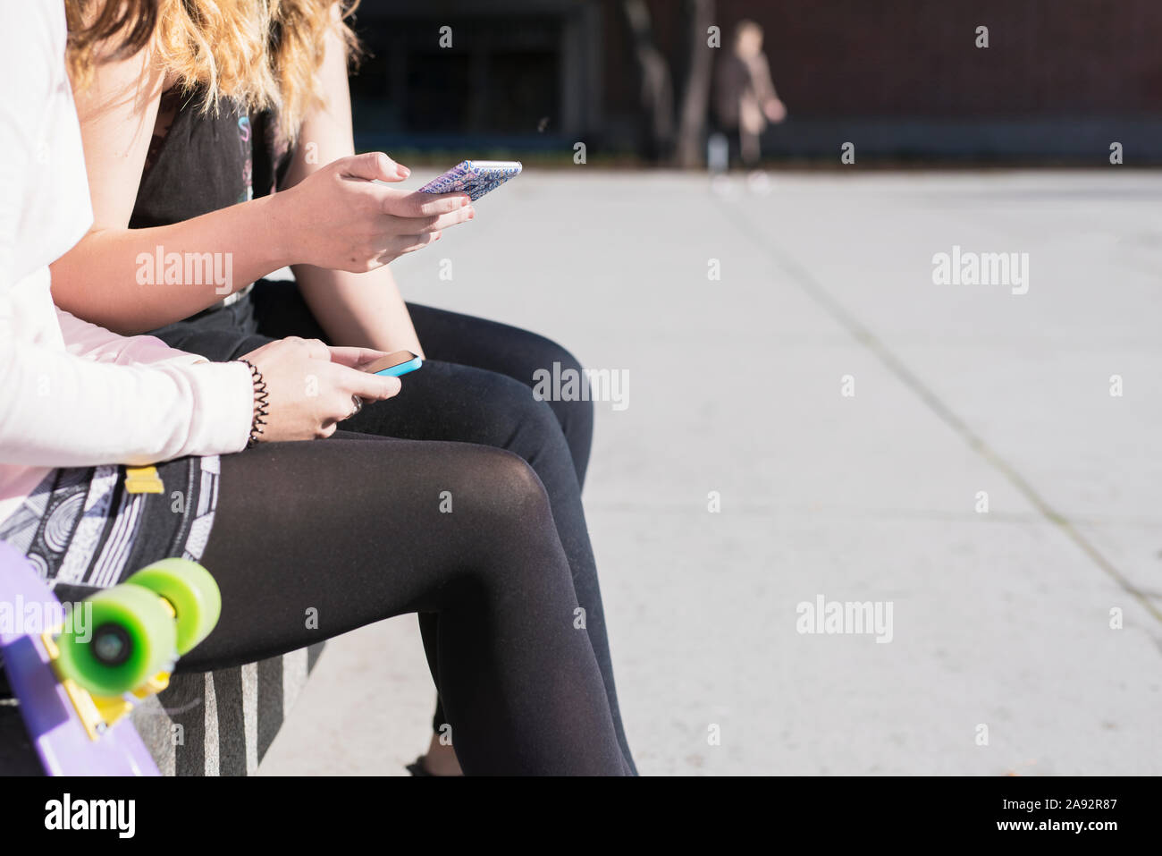 Women using cell phone Stock Photo - Alamy
