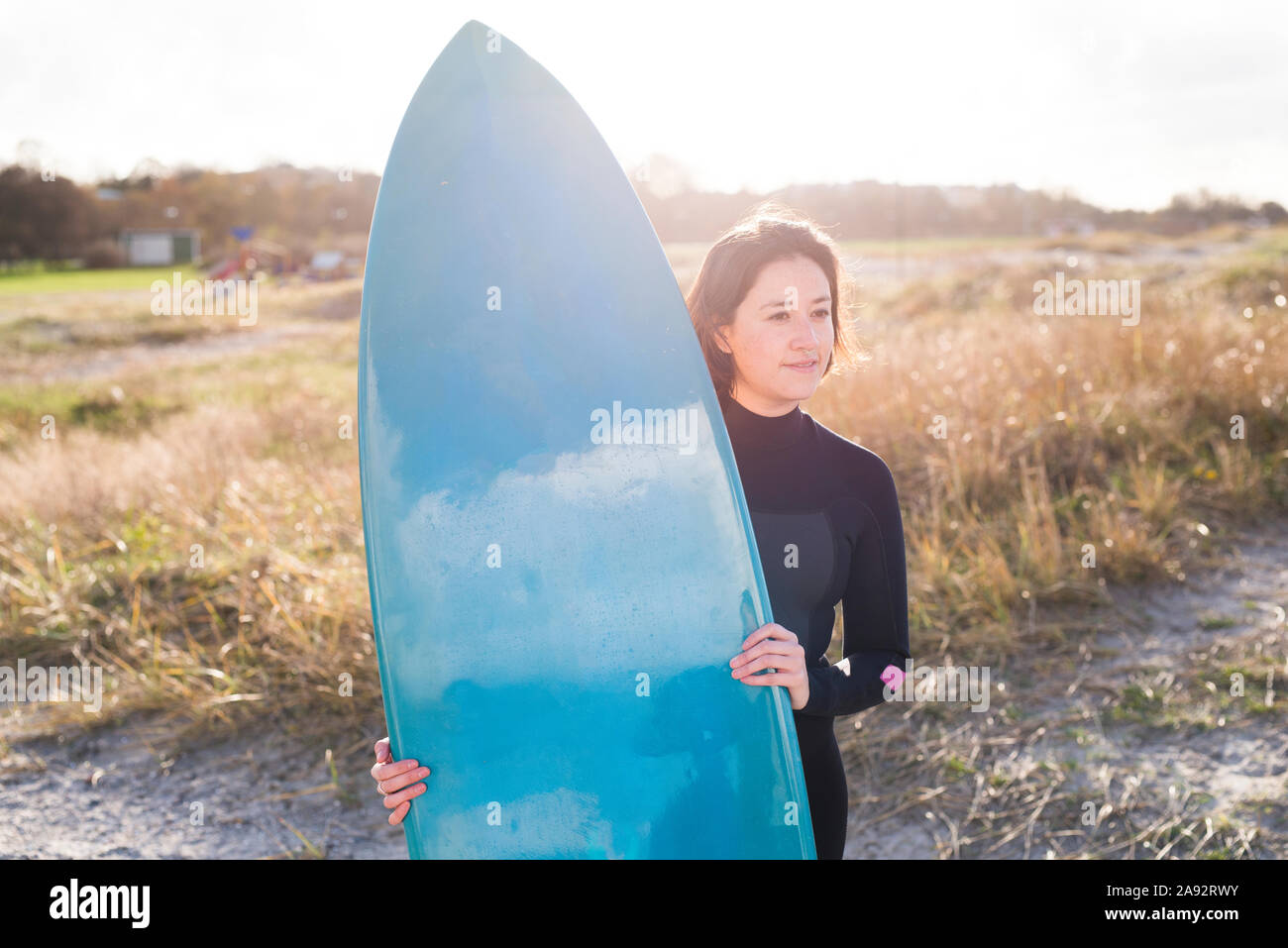 Female surfer standing on hi-res stock photography and images - Alamy