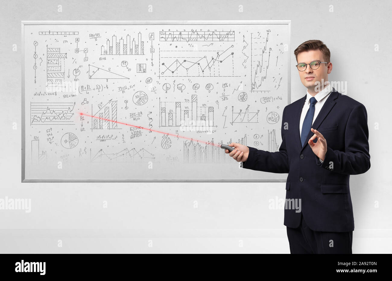 Professor with laser pointer teaching geometry Stock Photo - Alamy