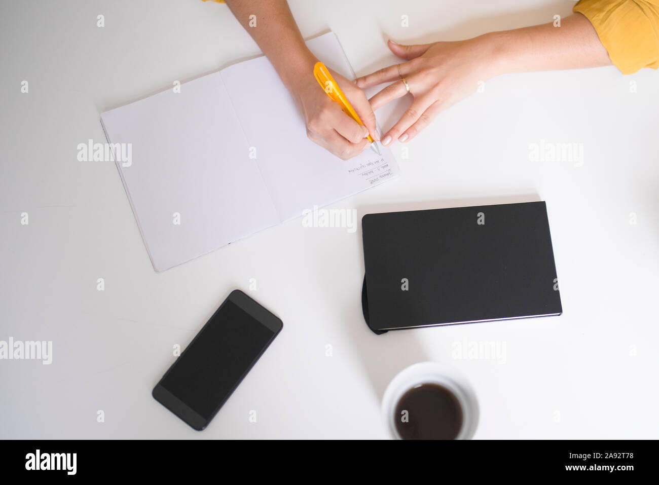 Writing her diary hi-res stock photography and images - Alamy