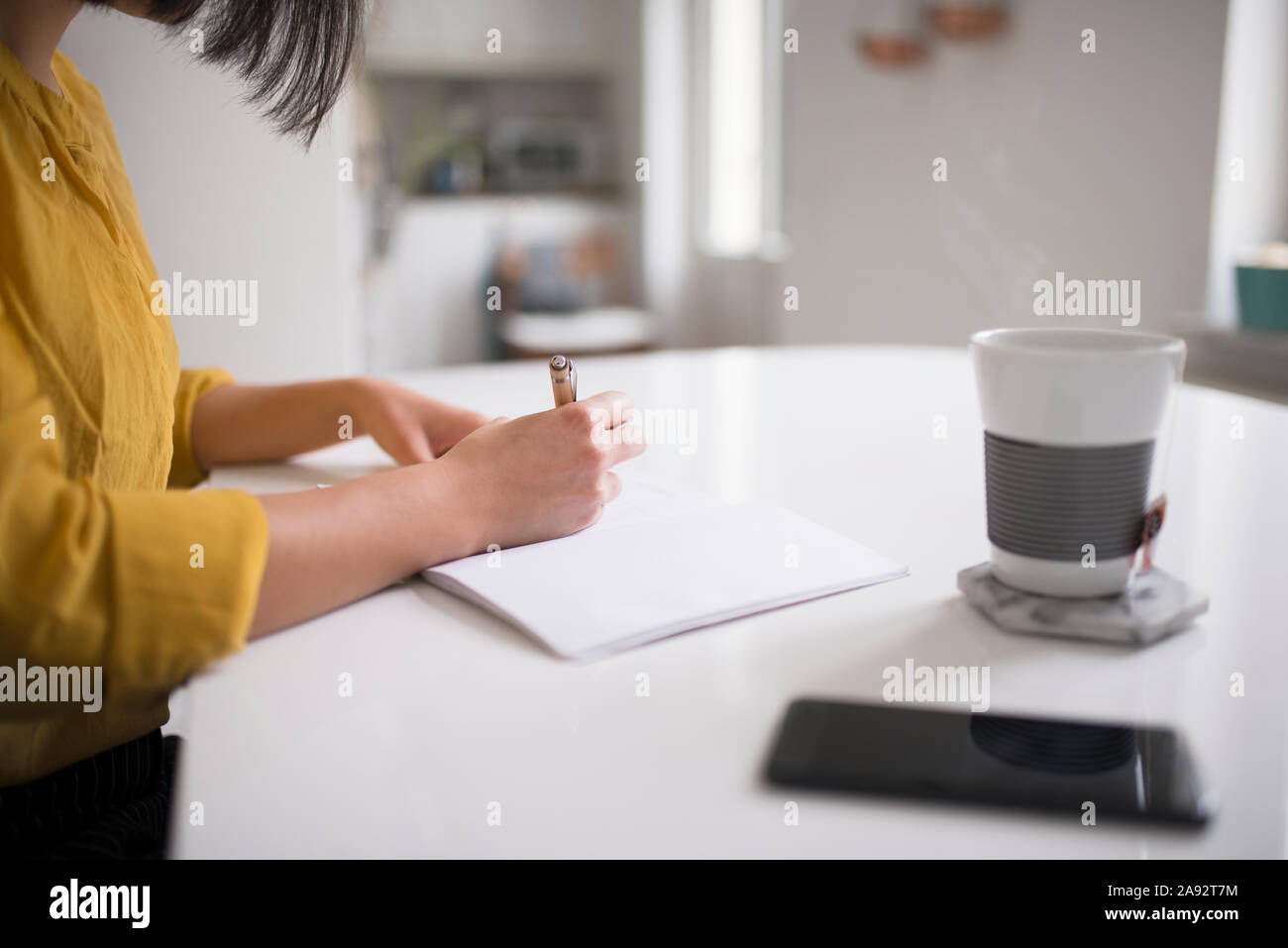 Writing her diary hi-res stock photography and images - Alamy