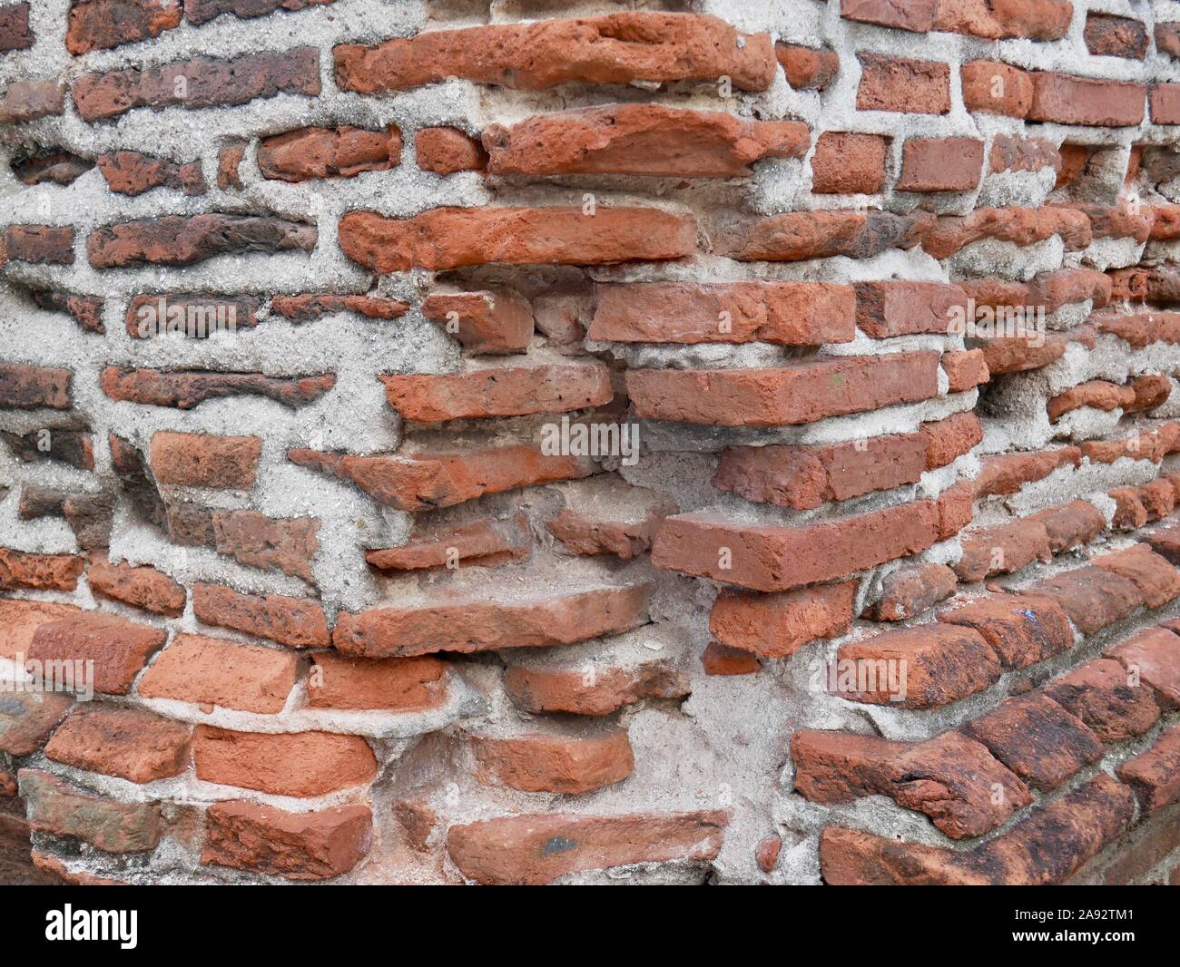 Broken stone wall close- up Stock Photo - Alamy