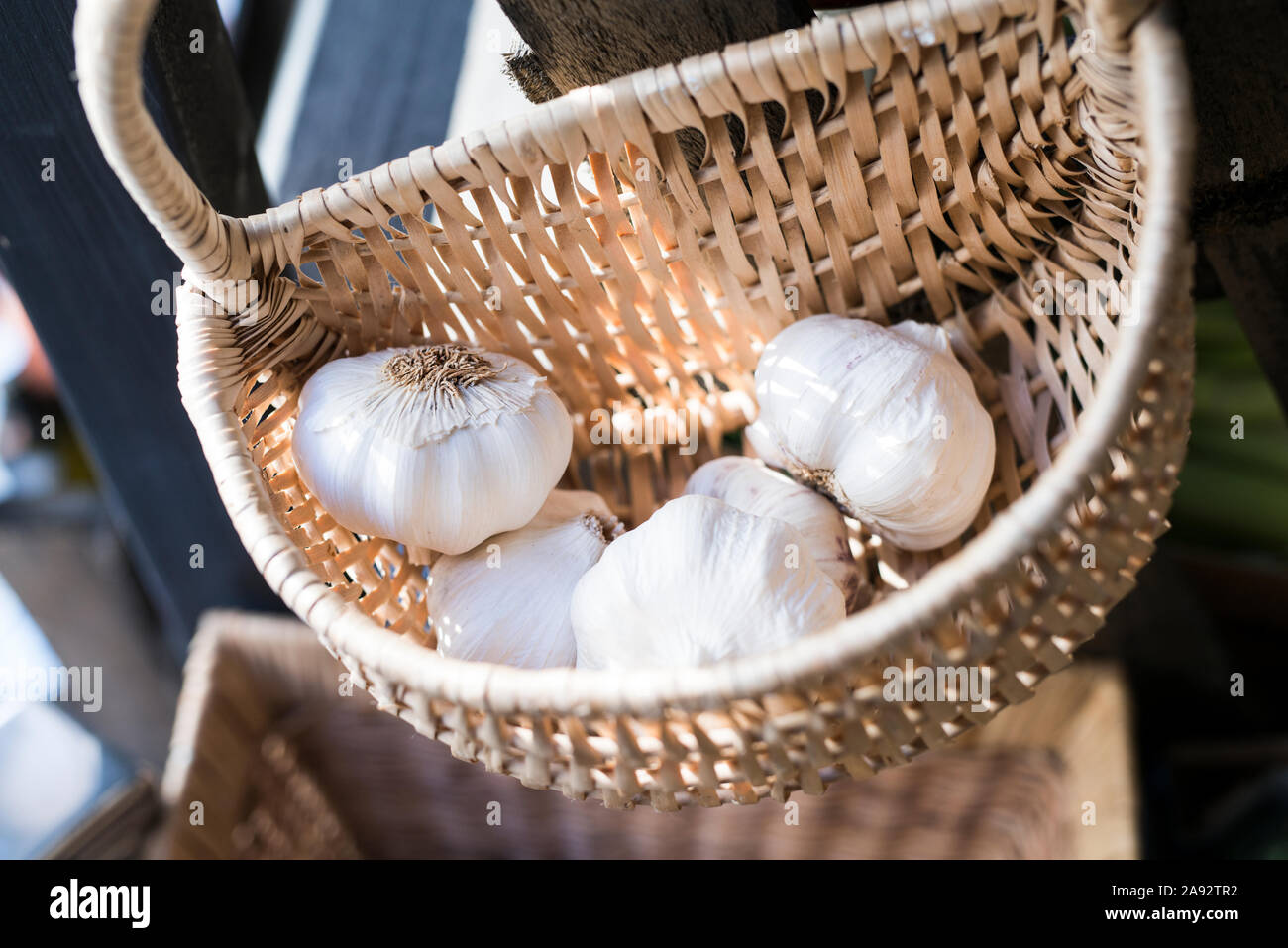 Garlic in basket Stock Photo - Alamy