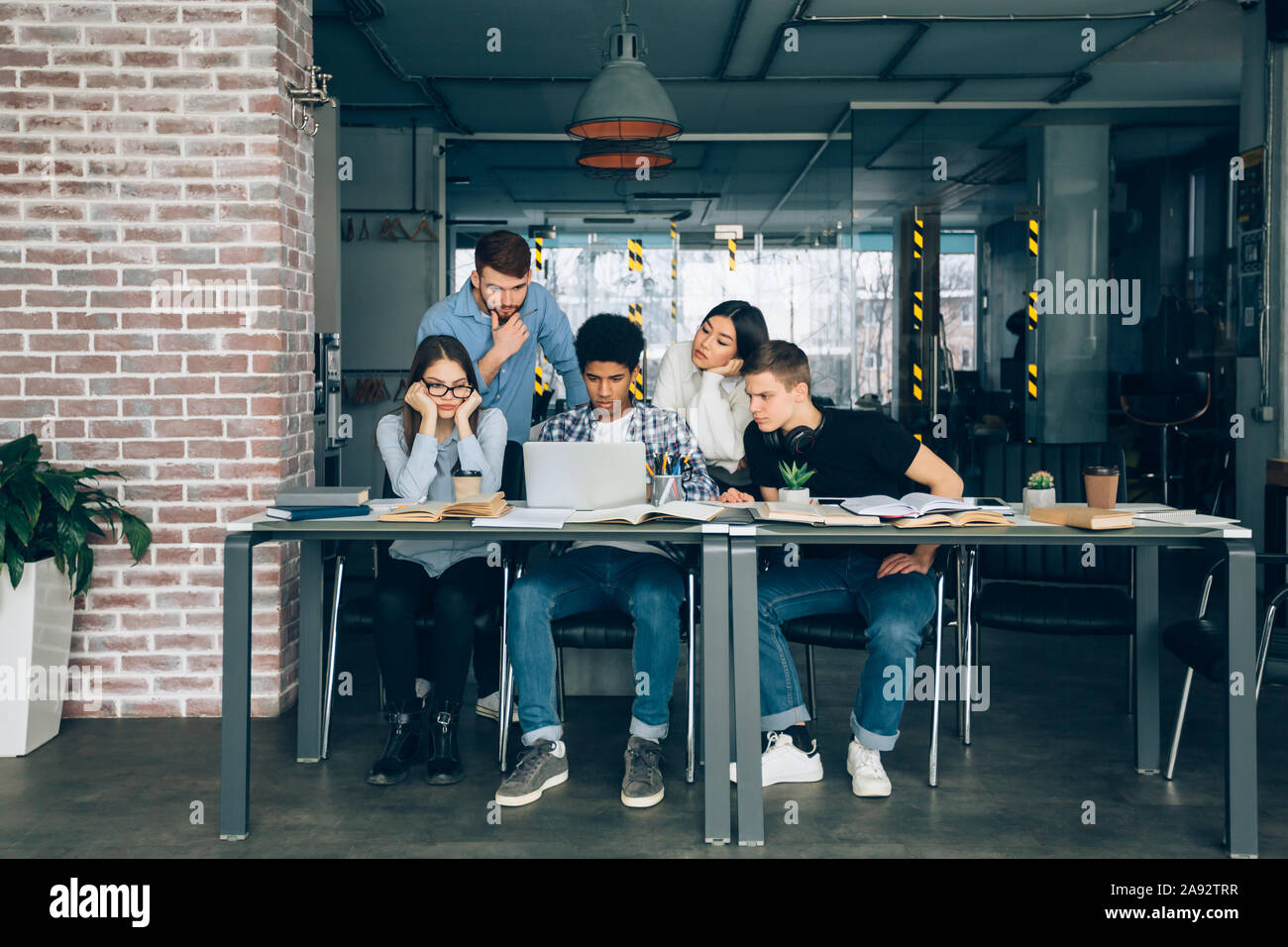 College library. Students studying together on group work Stock Photo ...