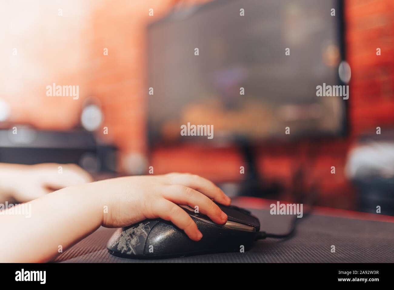 little boy playing games on computer Stock Photo - Alamy