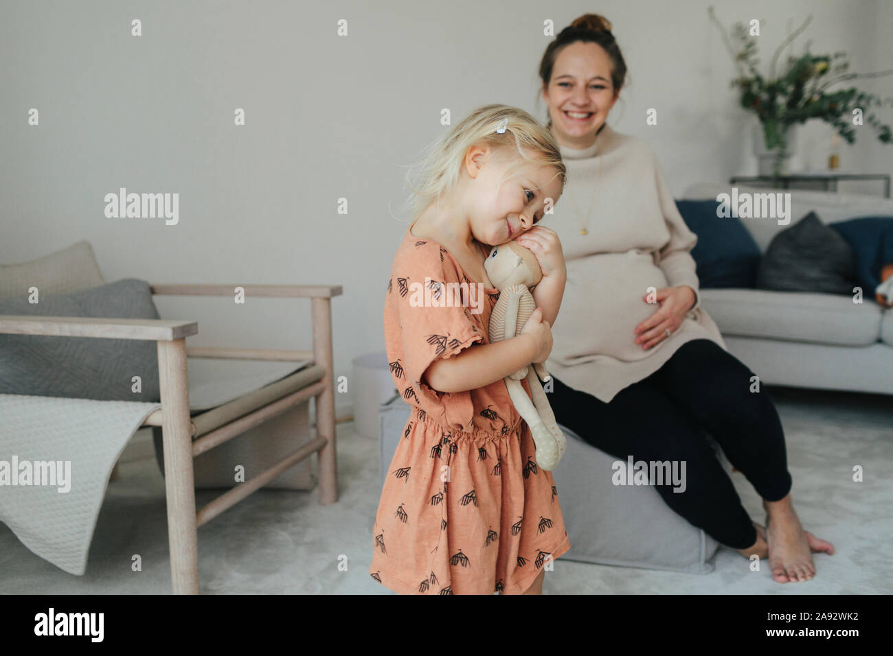 Child cuddling toy hi-res stock photography and images - Alamy