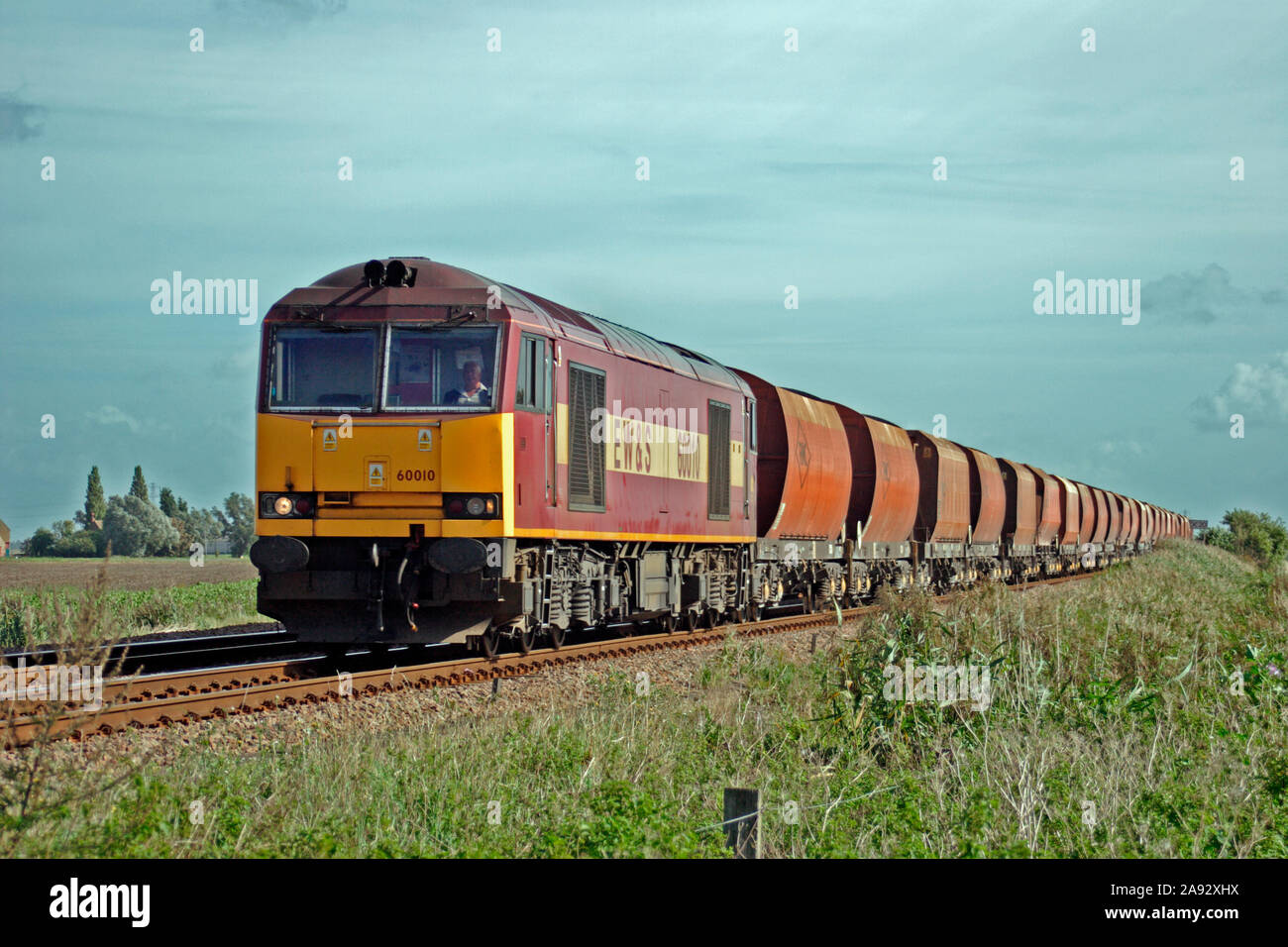 A class 60 diesel locomotive number 60010 working a train of empty ...