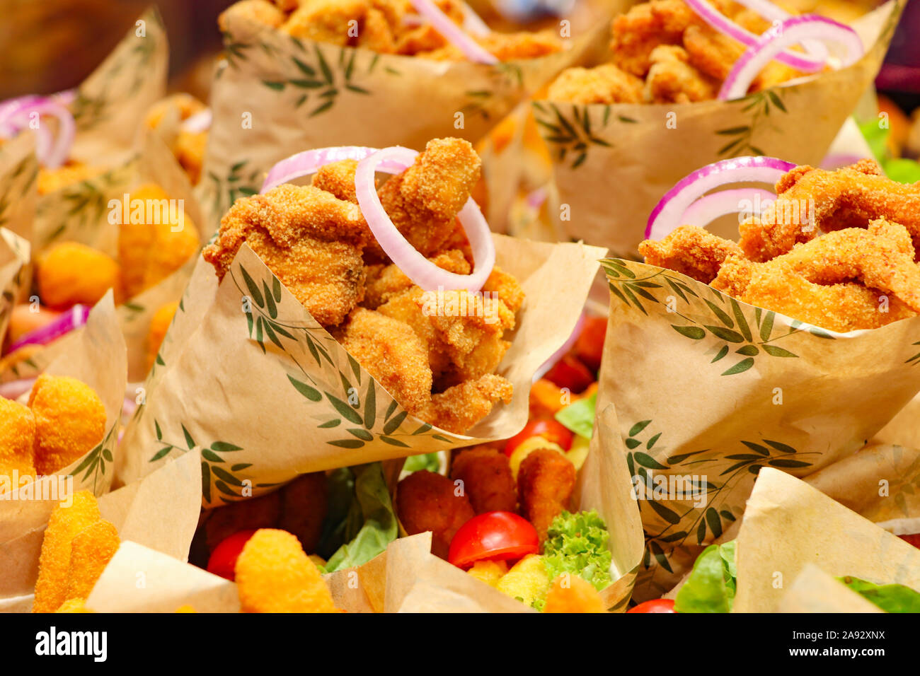 Barcelona food market snacks of friend seafood Stock Photo - Alamy
