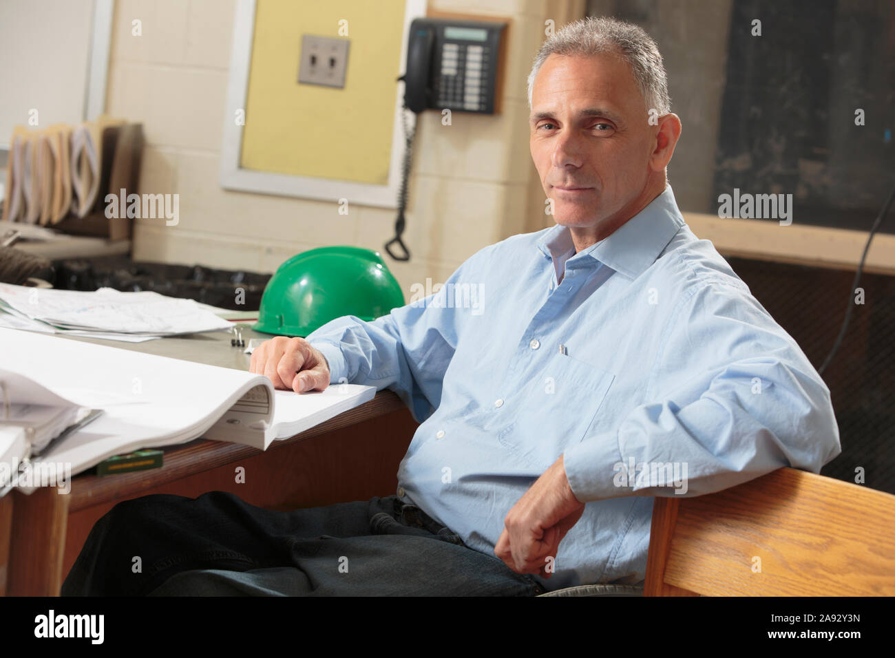 Project engineer with a Spinal Cord Injury in a wheelchair looking at ...