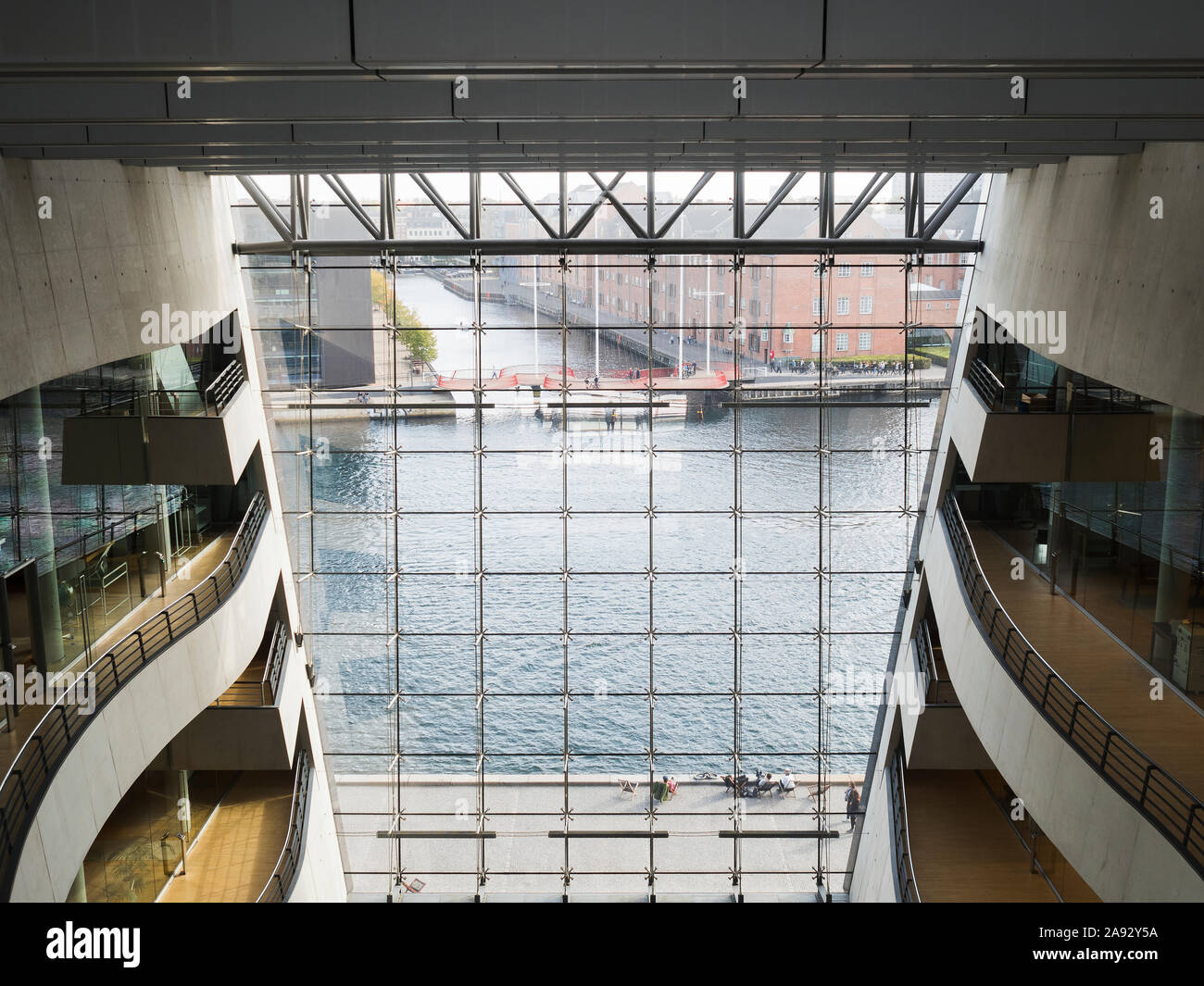 Water seen through modern building window Stock Photo - Alamy