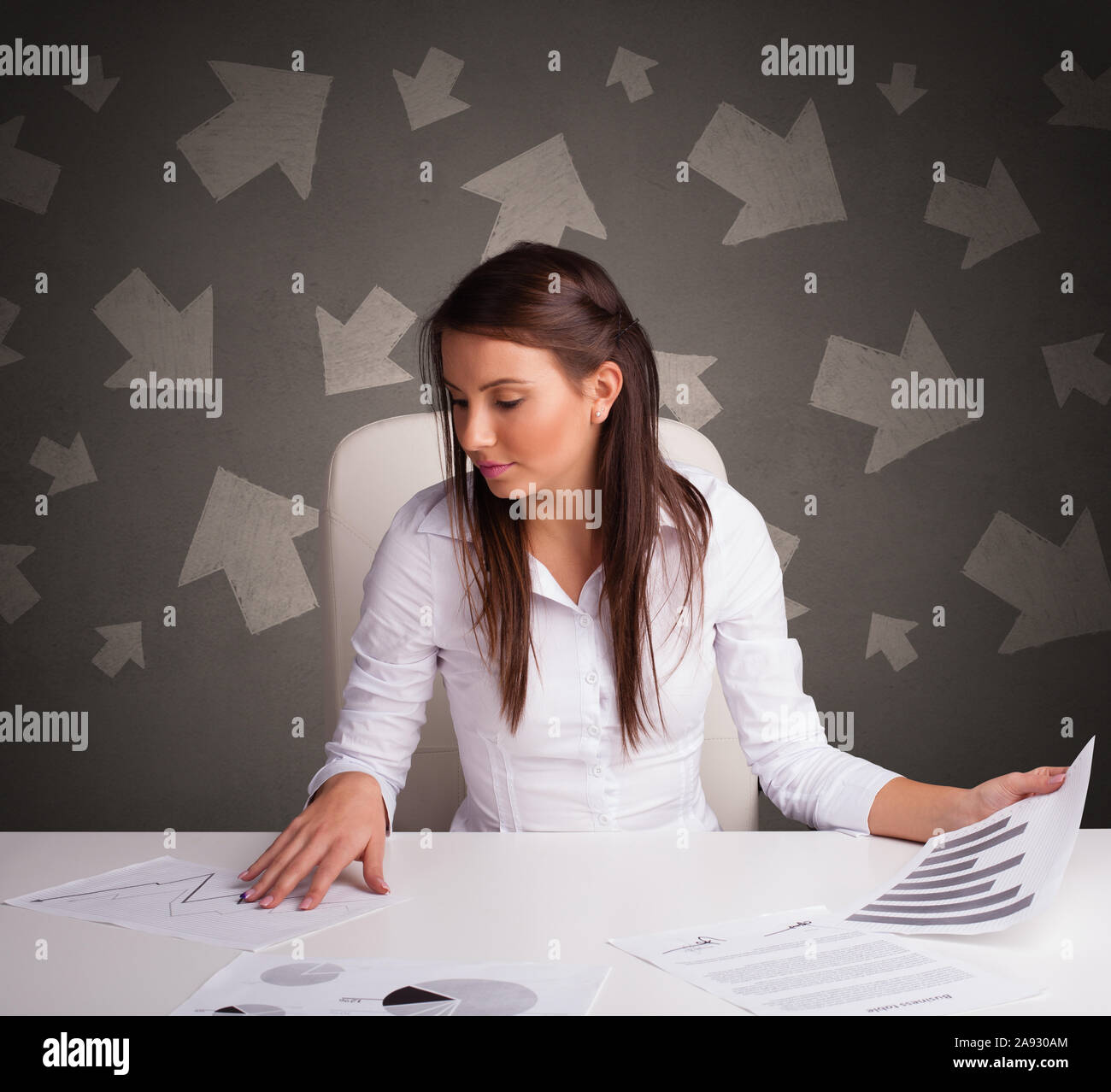 Manager in front of the office desk with different direction concept ...