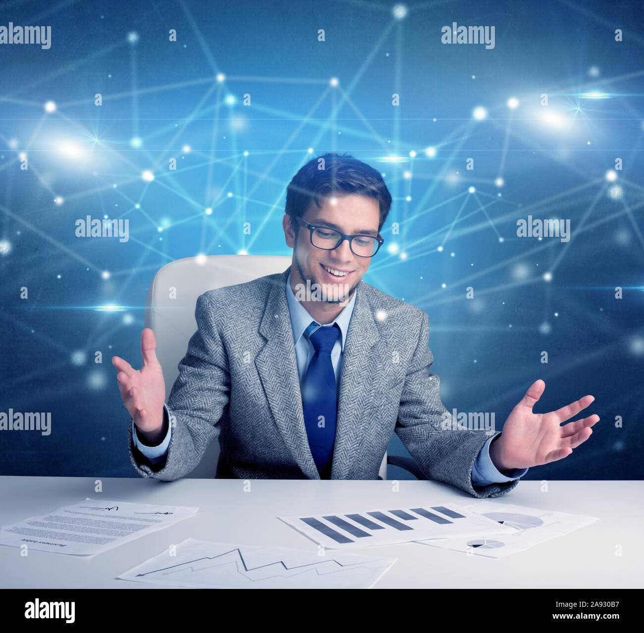 Manager in front of the office desk with networking concept Stock Photo ...