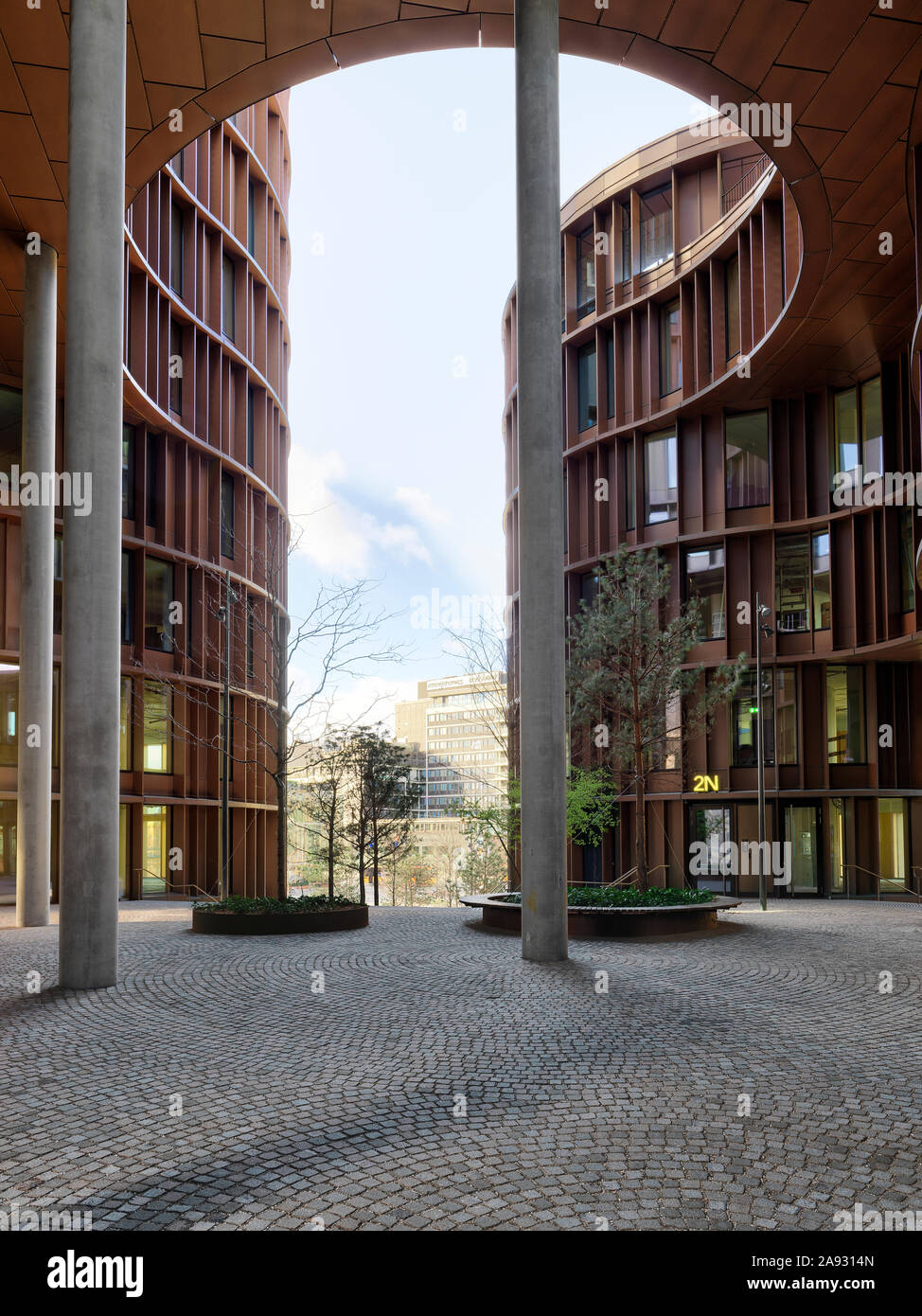 Modern building with courtyard Stock Photo - Alamy