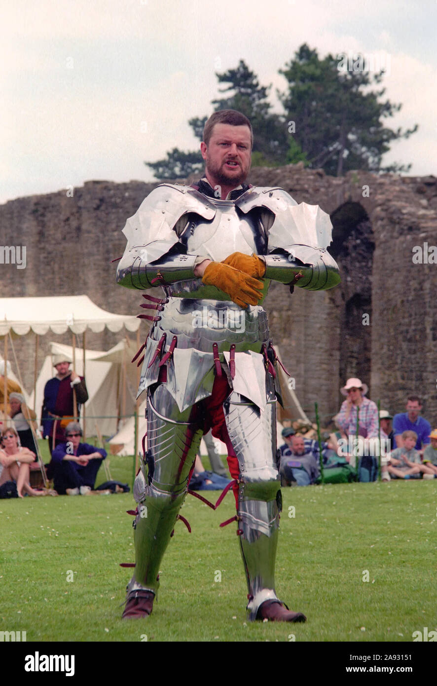 Medieval reenactment with a knight in armour Stock Photo - Alamy