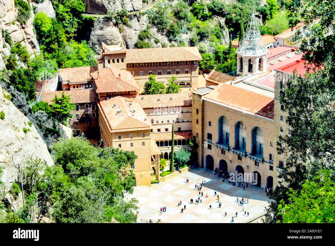 view from the mountain to the top of Santa Maria de Montserrat abbey in ...