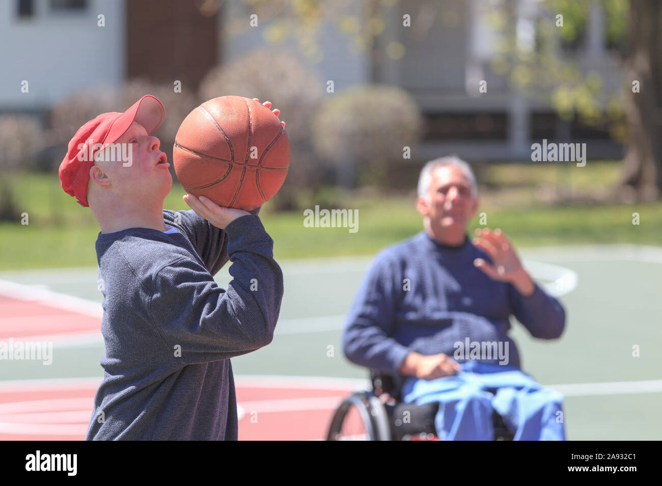 Father with Spinal Cord Injury and his son with Down Syndrome playing ...