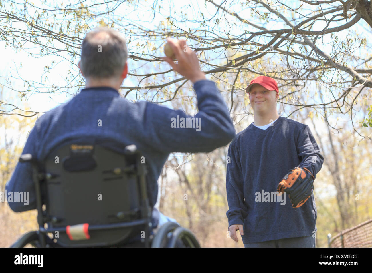 Father with Spinal Cord Injury and his son with Down Syndrome playing ...