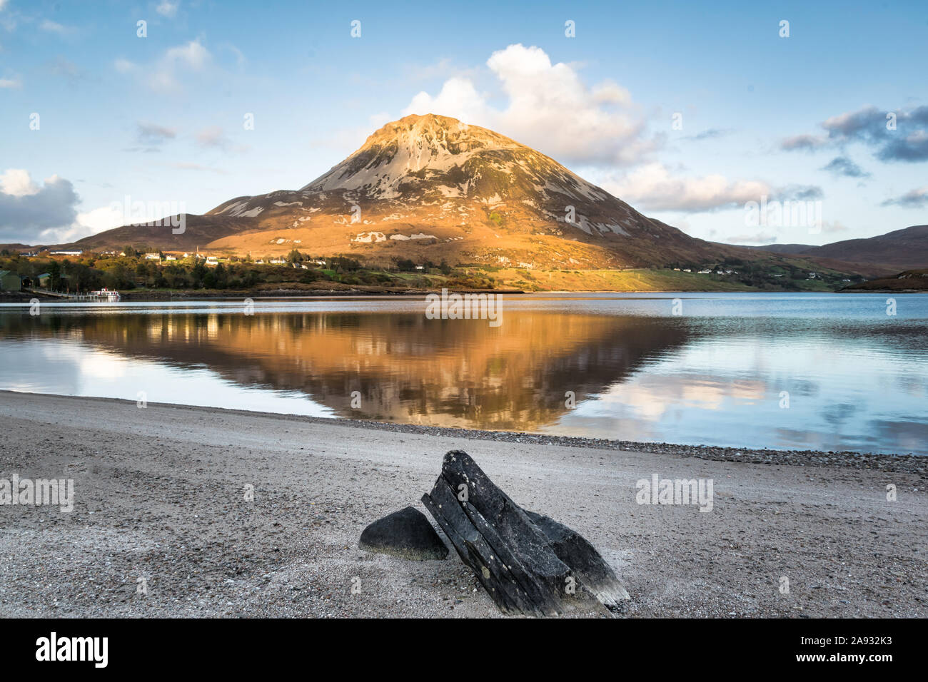 Errigal Mountain in Donegal Ireland being reflected in a lake in front ...