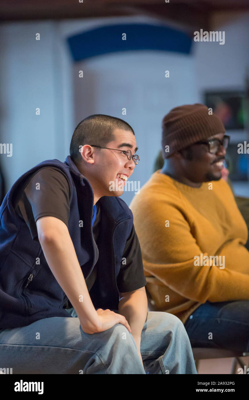 Black man with ADHD and Asian man with Autism in a meeting Stock Photo ...