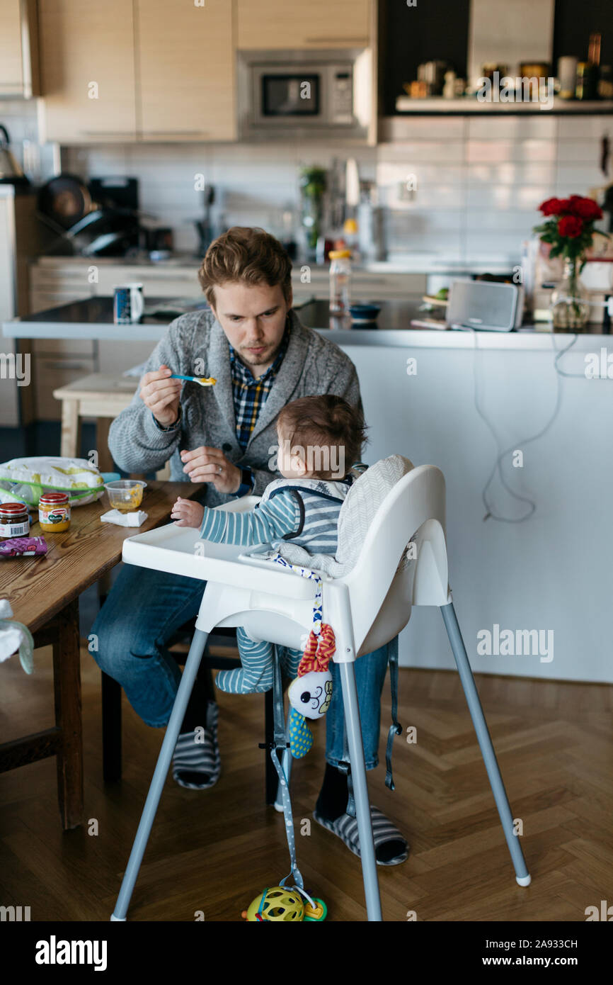 Father feed child hi-res stock photography and images - Alamy