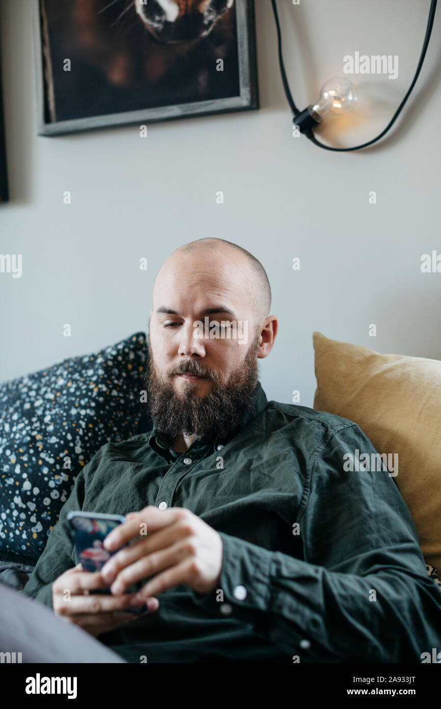 Man using cell phone Stock Photo - Alamy