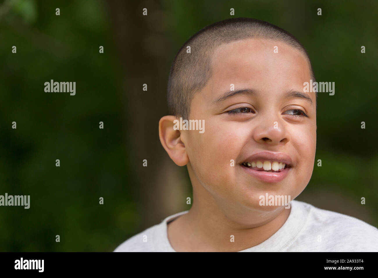 Portrait of happy Hispanic boy with Autism Stock Photo - Alamy