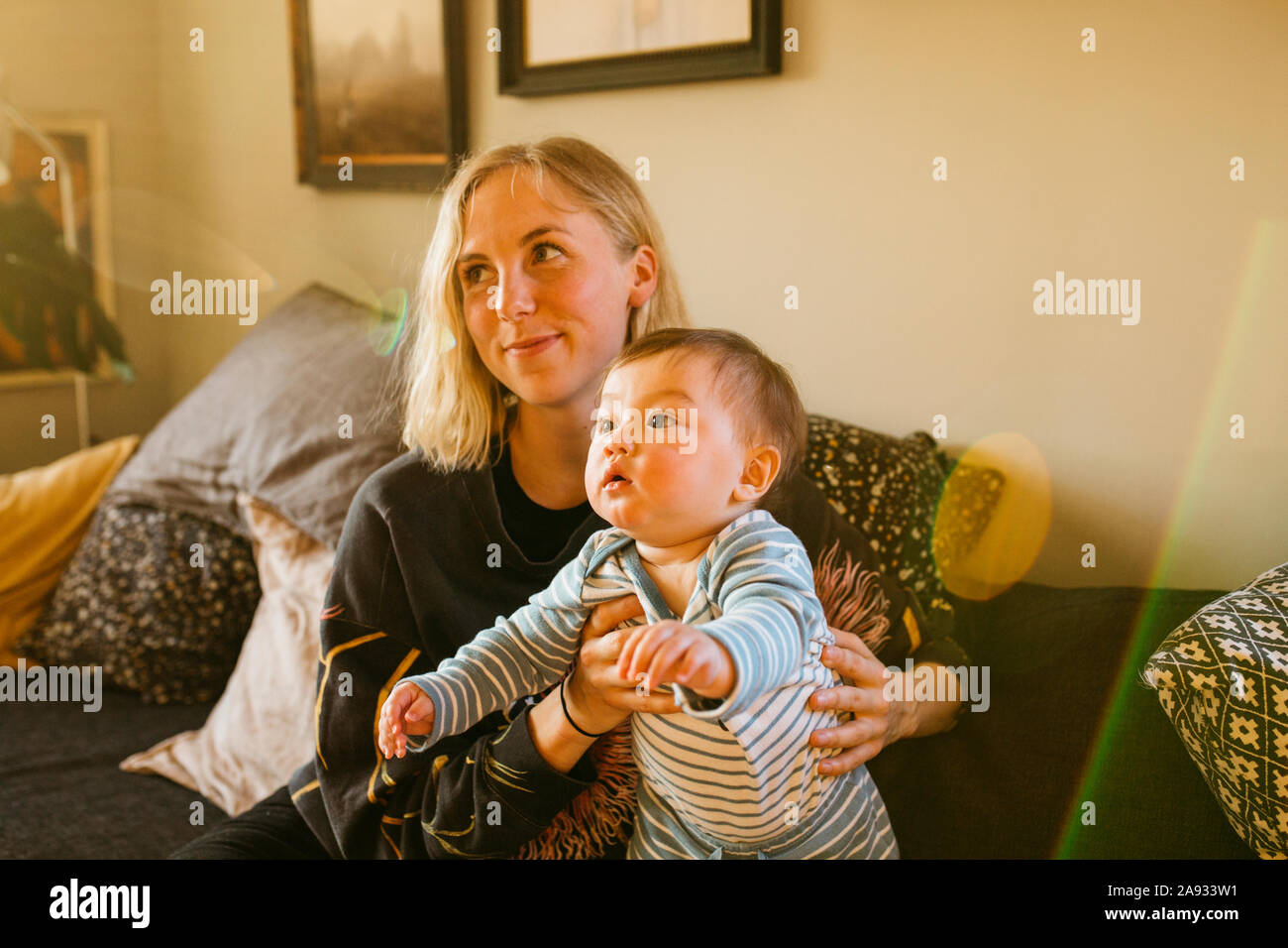Baby standing up on hi-res stock photography and images - Alamy